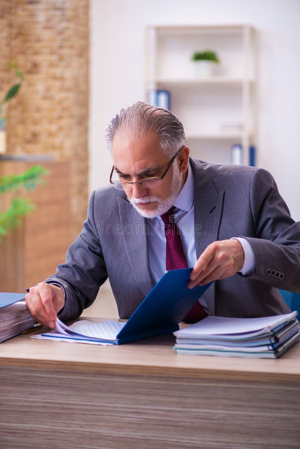Experienced Male Employee Working in the Office Stock Image - Image of ...