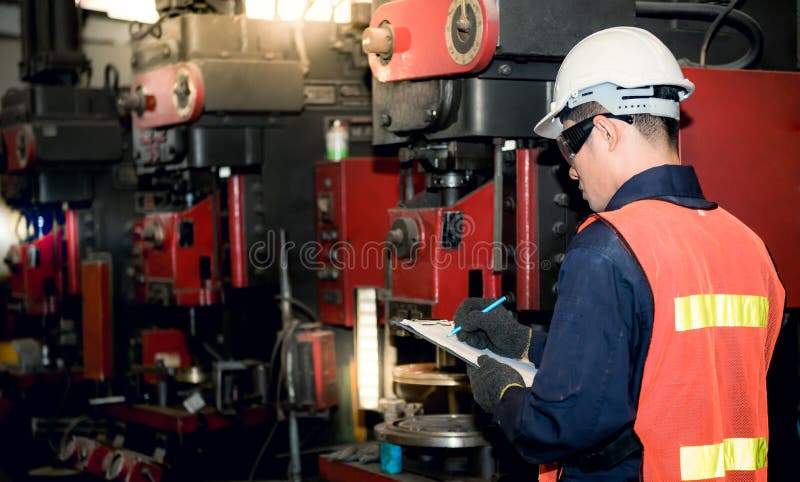 Experienced Entrepreneurs, Engineers Man is Writing a Maintenance ...