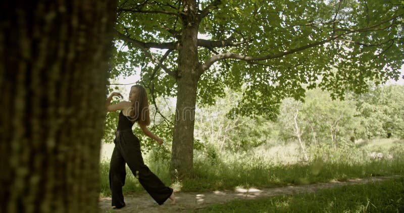 Experienced Female Dancer Gracefully Performs a Modern Dance in the ...