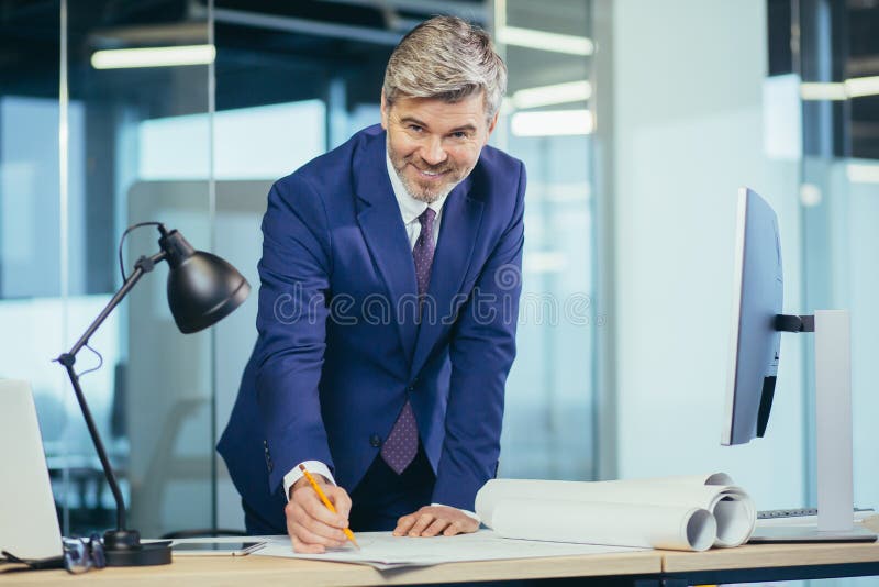 Experienced Gray-haired Designer Architect, Smiling and Looking at ...