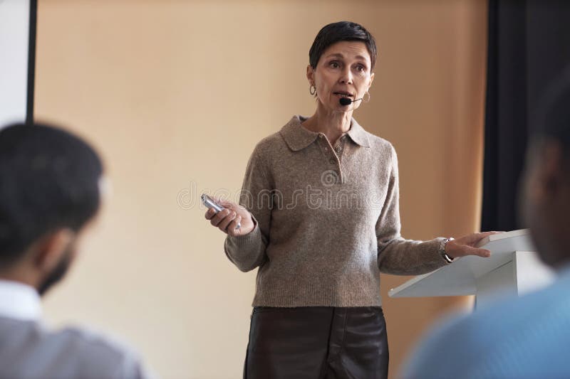 Experienced HR Manager Speaking in Microphone in Front of Audience ...