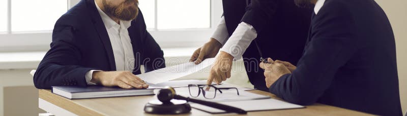 Lawyer Giving a Consultation To a Client, Providing Legal Advice and ...