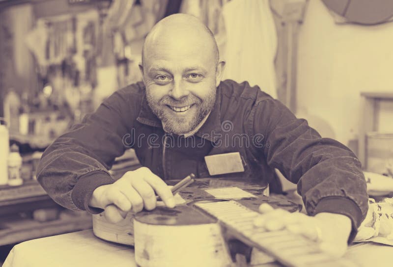 Experienced Man Making a Guitar Stock Image - Image of clothing ...