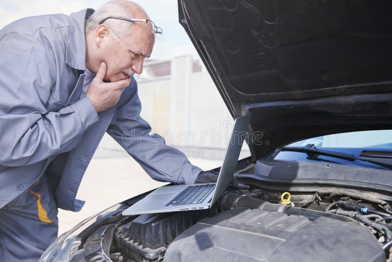 Experienced mechanic stock photo. Image of bending, contemporary - 59129462
