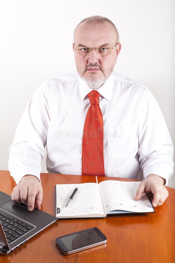 Experienced Office Boss by the Desk. Stock Image - Image of smartphone ...