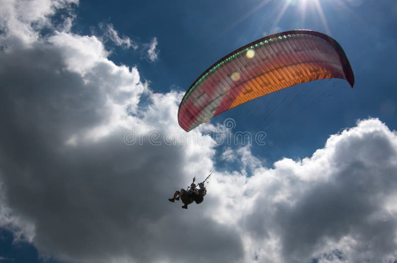 Experienced Paraglider Pilot Flying Two Seated Paraglider Stock Photo ...