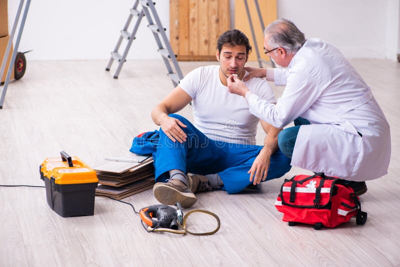 Experienced Paramedic Helping Workman Bitten by Snake Stock Image ...