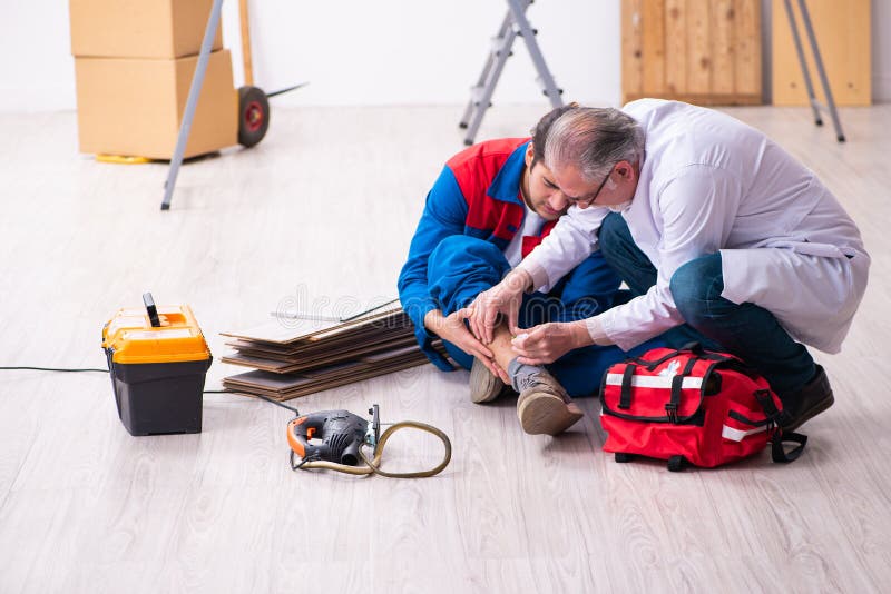 Experienced Paramedic Helping Workman Bitten by Snake Stock Image ...