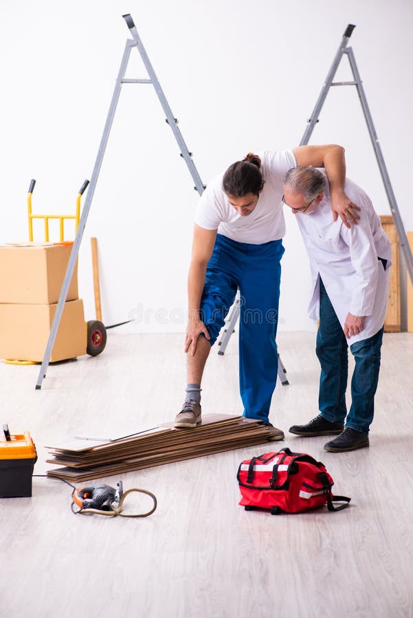 Experienced Paramedic Helping Workman Bitten by Snake Stock Image ...