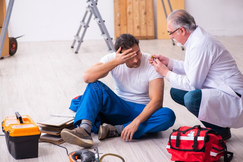 Experienced Paramedic Helping Workman Bitten by Snake Stock Image ...