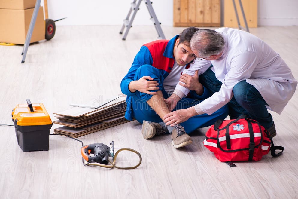 Experienced Paramedic Helping Workman Bitten by Snake Stock Photo ...
