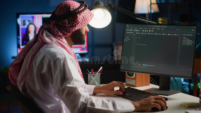 Freelancing Programmer Writes Artificial Intelligence Code On Desktop