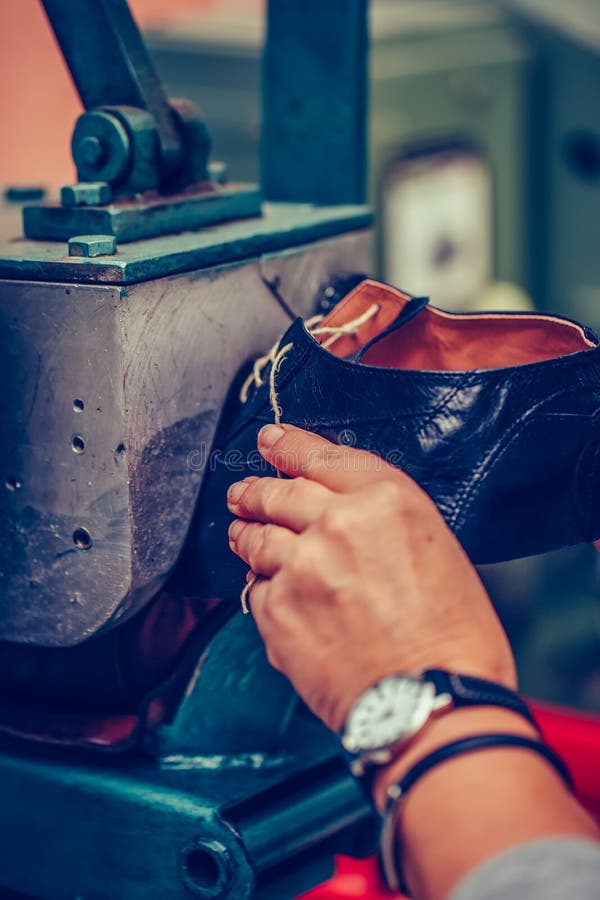 Experienced Shoemaker Using Special Machine Tool for Making a Shoes ...