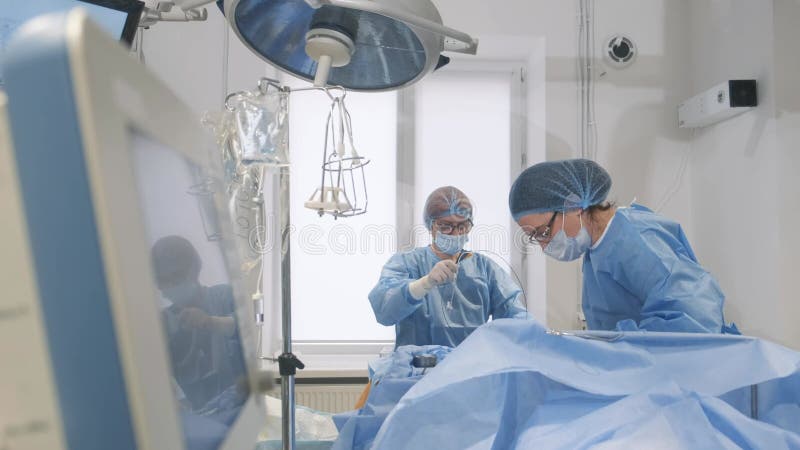 Experienced Surgeons Perform a Complex Procedure for Varicose Veins ...