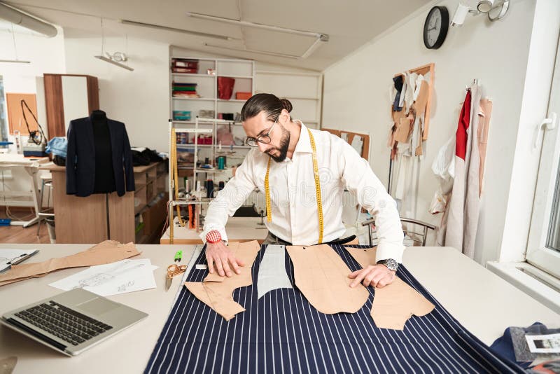 Experienced Tailor Concentrated on Preparing Fabric for Cutting Stock ...