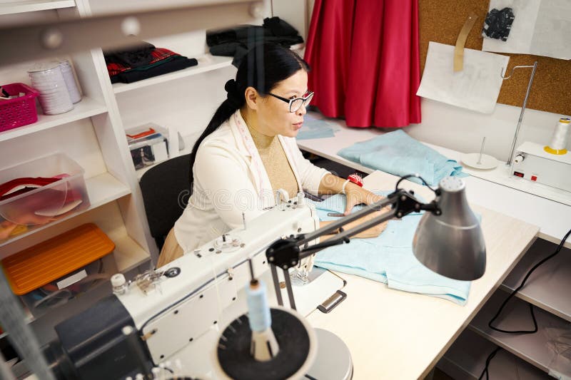 Tailoring Master Greets a Lady Fashion Designer at Her Workplace Stock ...