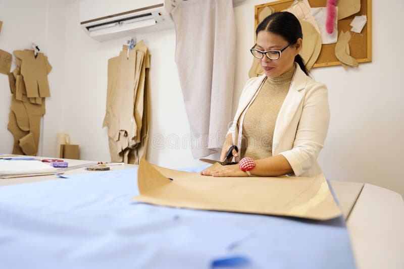 Tailoring Master Greets a Lady Fashion Designer at Her Workplace Stock ...