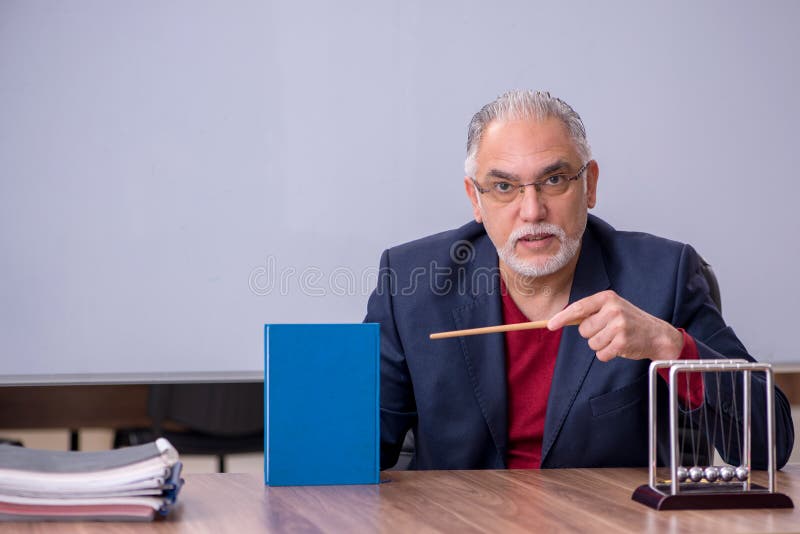 Old Teacher Physicist Sitting in the Classroom Stock Image - Image of ...