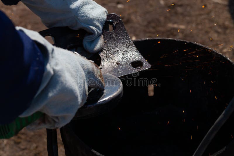 An Experienced Welder at Work. Preparation and Welding Process of Cast ...