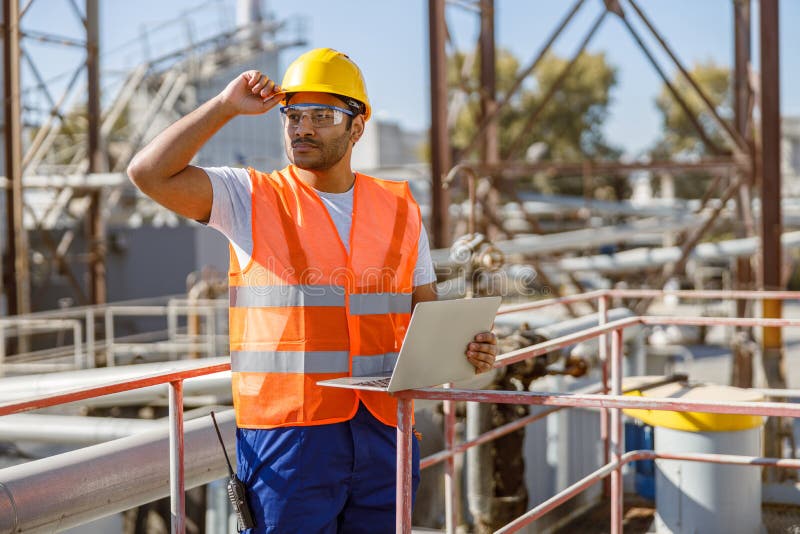 Experienced Worker Concentrating at His Work in Plant Stock Photo ...