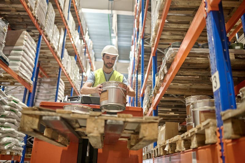 Experienced Worker Handling Goods in the Storage Area Stock Image ...