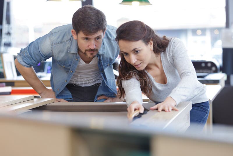 Experienced Worker Helping Woman at Windows Factory Stock Image - Image ...