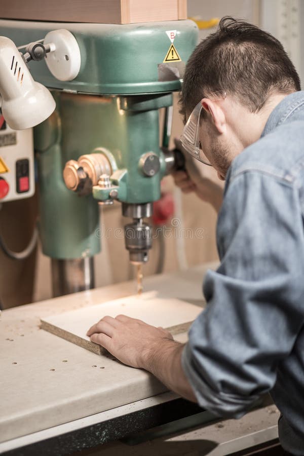 Experienced Worker Using Professional Drill Stock Photo - Image of ...