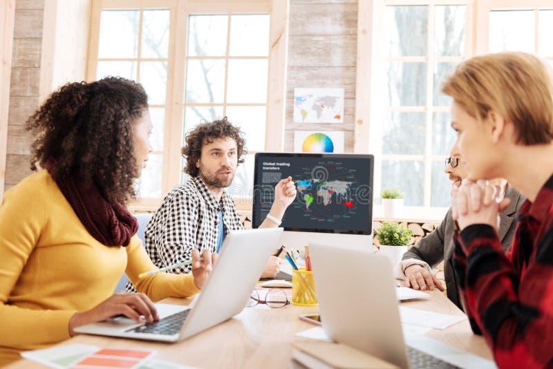 Experienced Workers Discussing Work in the Office Stock Photo - Image ...