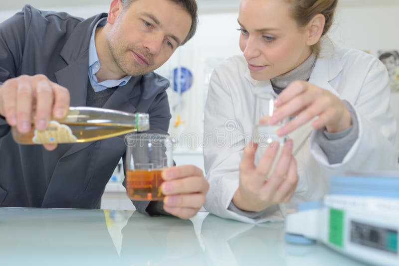 Experiment chemical in lab stock photo. Image of fluid - 124015872