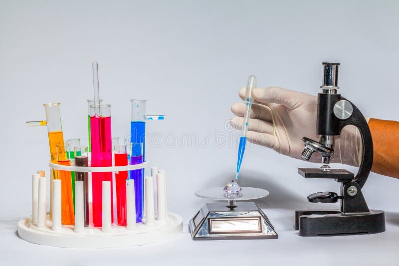 Experiments in Mixing Chemical Substances into Glass Tubes Stock Image ...