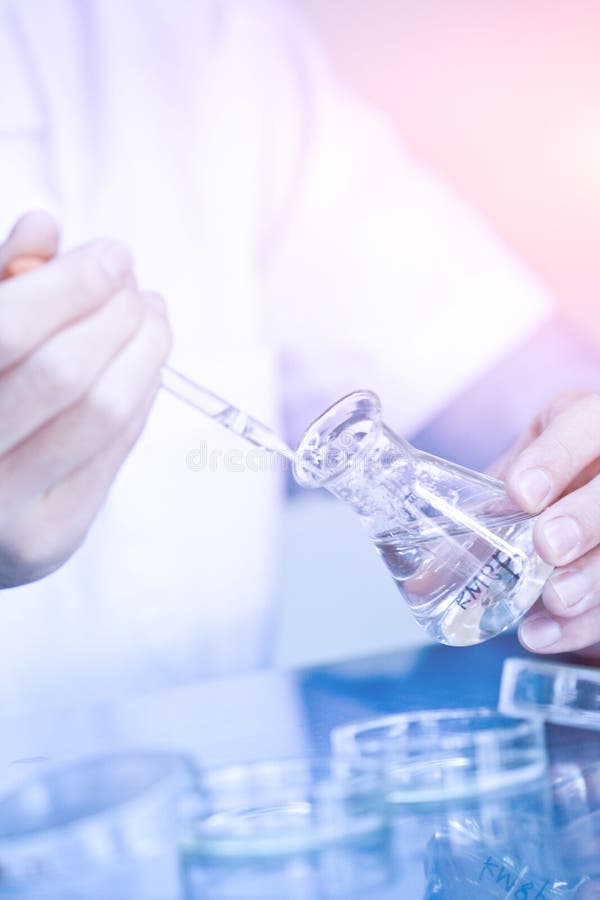Experiment with a Test Tube in a Laboratory Stock Photo - Image of ...