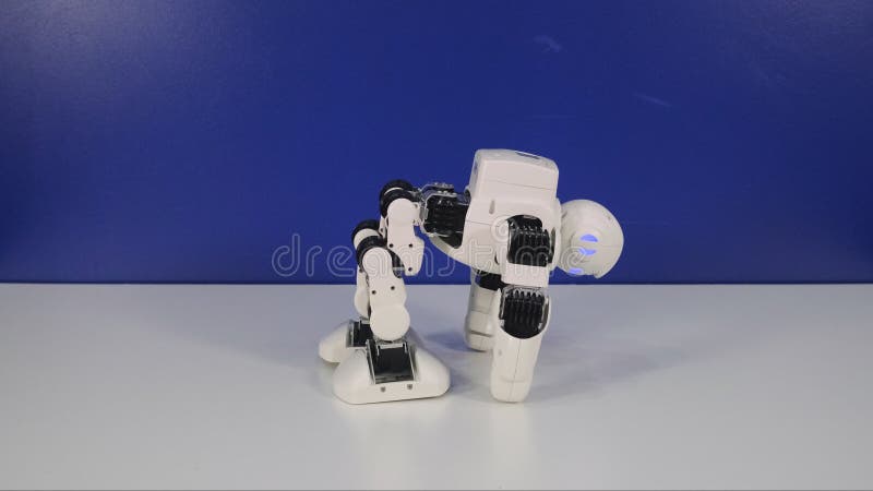 Humanoid Robot Doing Push-ups on Table Stock Footage - Video of science ...