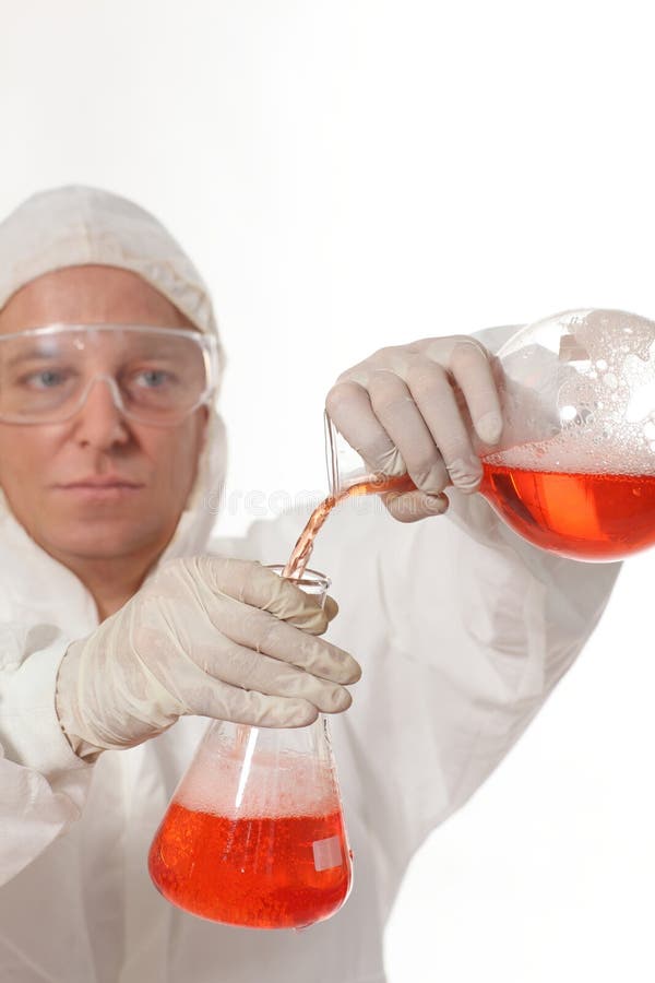 Smirking Mad Scientist Pouring Liquid Stock Photo - Image of adult ...
