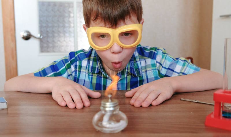 Experiments on Chemistry at Home. Surprised Boy is Looking at the ...
