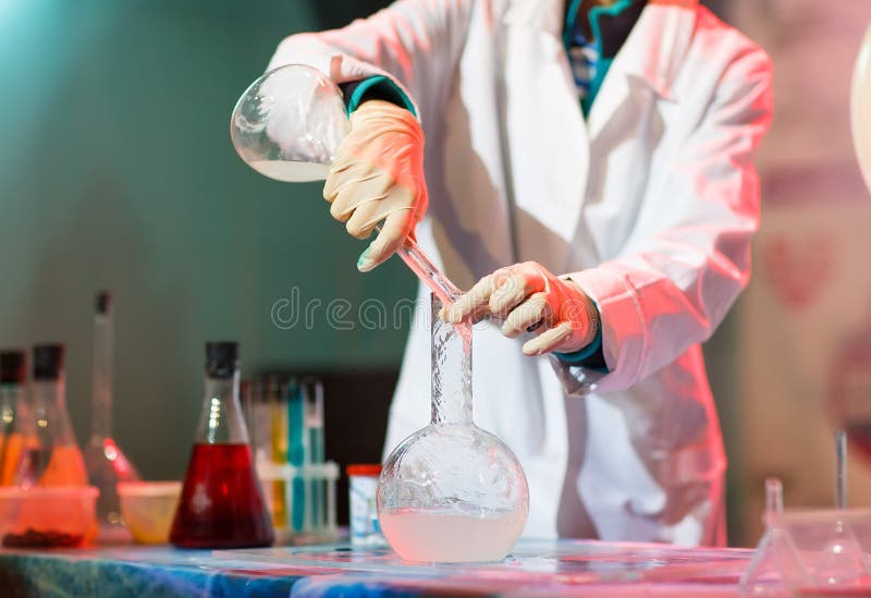 Experiments in a Chemistry Lab. Conducting an Experiment in the ...