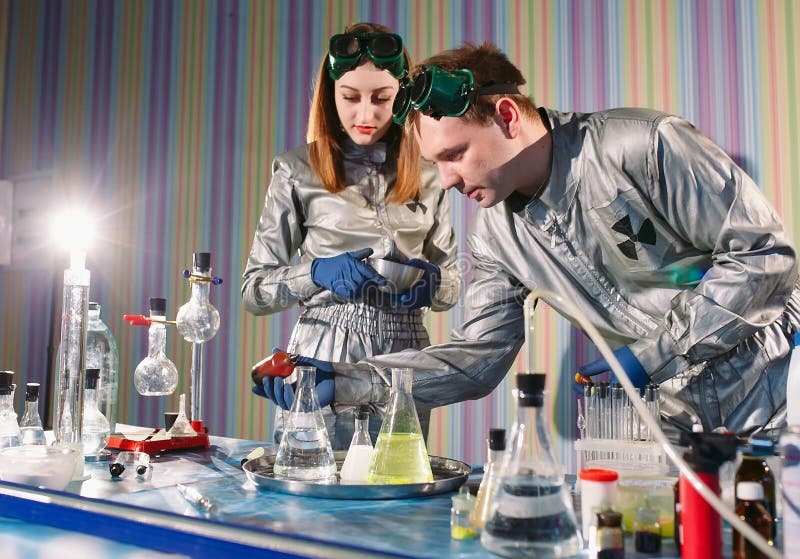 Experiments in a Chemistry Lab. Conducting an Experiment in the ...