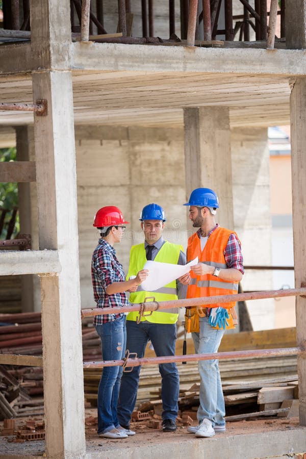 Expert Architect Team Studying Plan on Open Air Stock Photo - Image of ...
