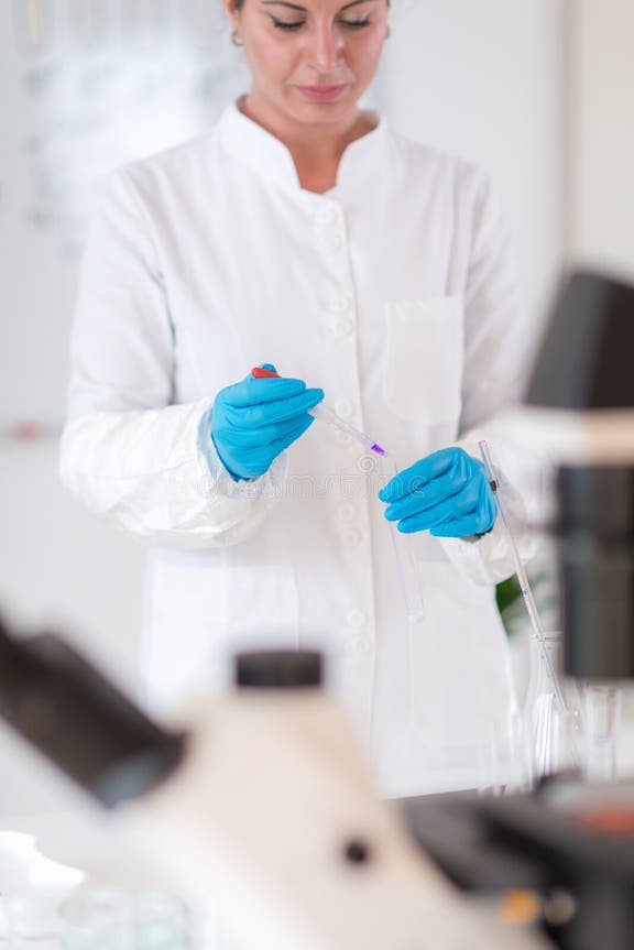 An Expert Inspects Inspects Milk Quality Control in Lab Stock Photo ...