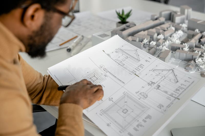 Expert Man Architect Drawing Blueprints in His Workplace Stock Image ...