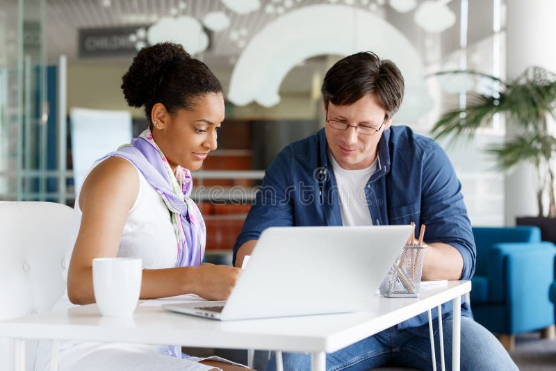 Expert is Ready To Help Her with Her Work Stock Photo - Image of ...