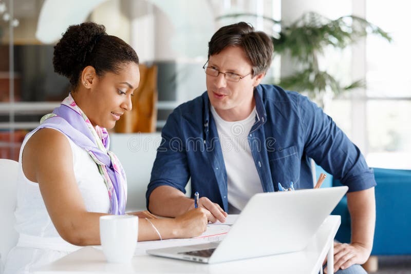 Expert is Ready To Help Her with Her Work Stock Photo - Image of ...