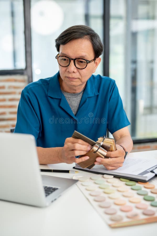Expert Senior Asian Male Interior Designer is Checking the Building ...