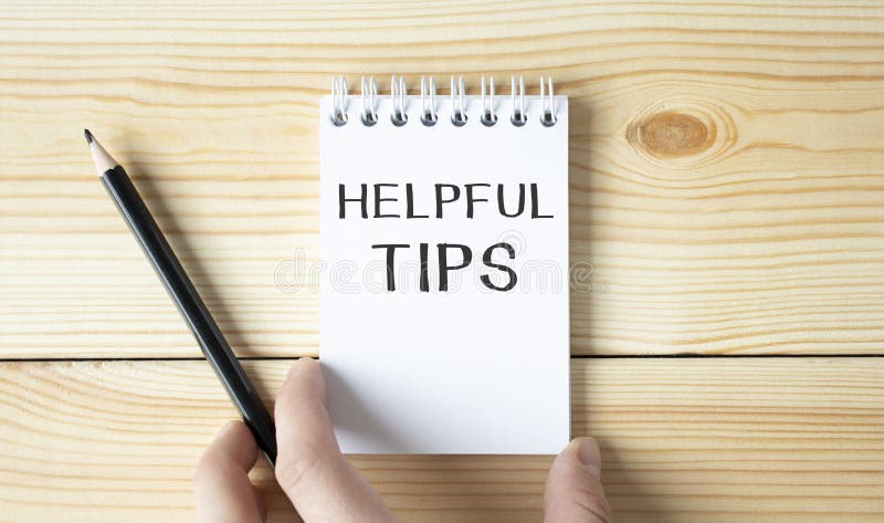 Expert Showing a Card with Helpful Tips Written Stock Photo - Image of ...