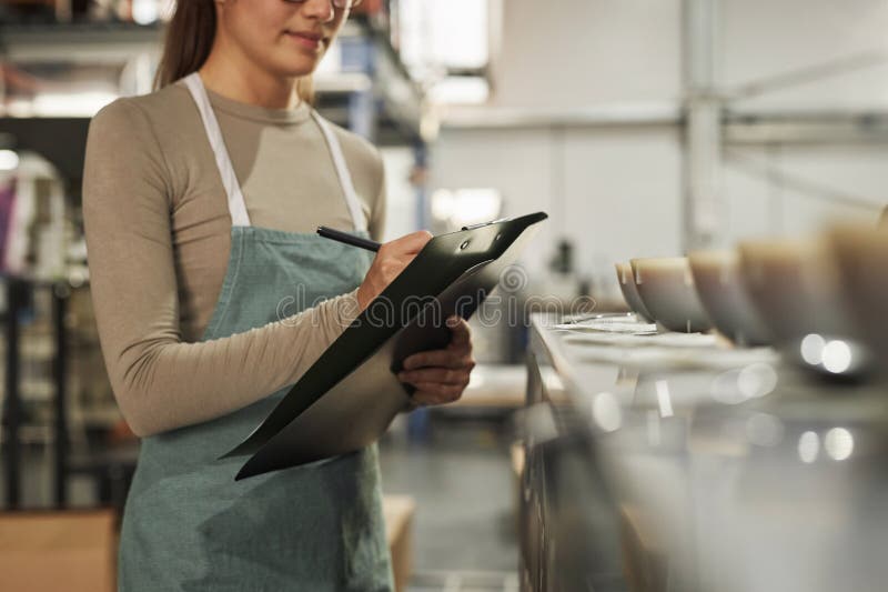 Expert Taking Notes on Clipboard during Coffee Cupping Stock Image ...