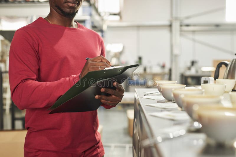 Expert Taking Notes on Clipboard during Cupping Stock Photo - Image of ...