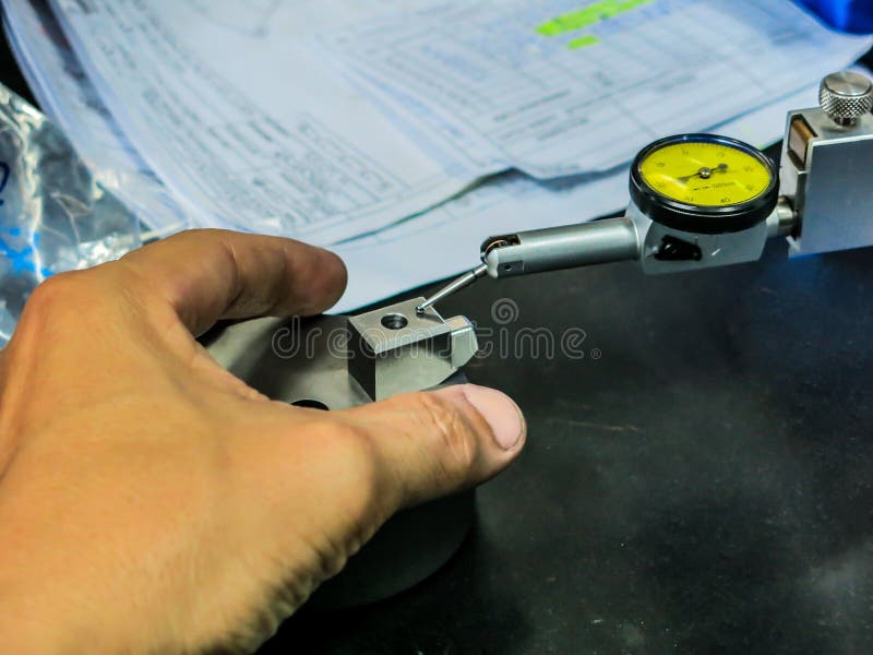 An Expert is Using a High-gauge Tool To Check the Scale of the ...