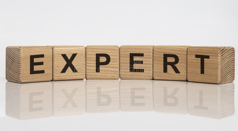 Expert Word Written on Wooden Blocks on White Glossy Table Stock Image ...