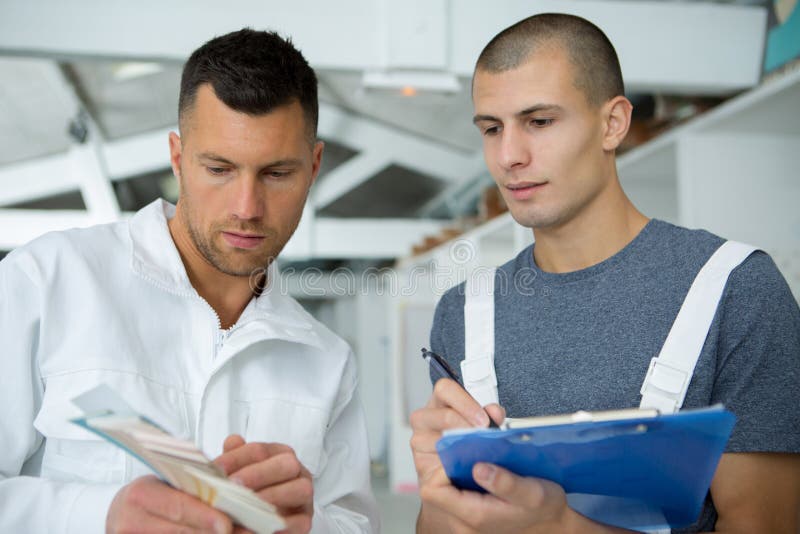 Experts Checking Information during Quality Control Stock Photo - Image ...