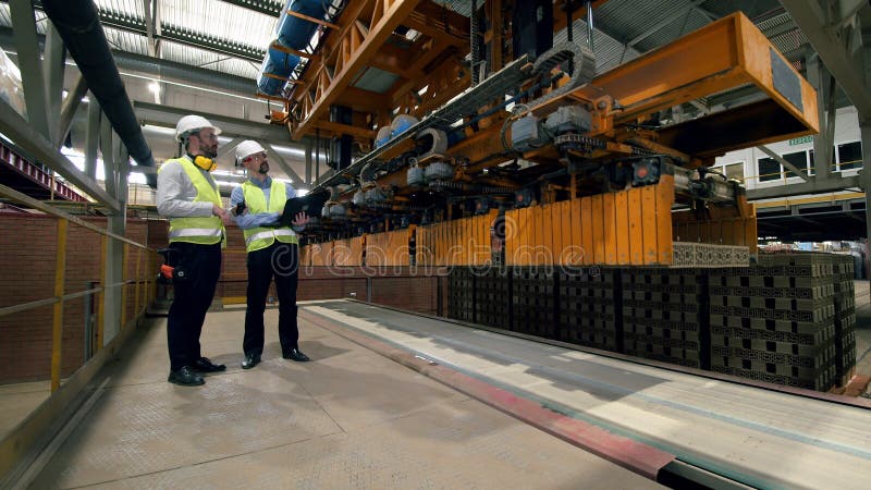Experts are Controlling Bricks Loading Process Stock Video - Video of ...