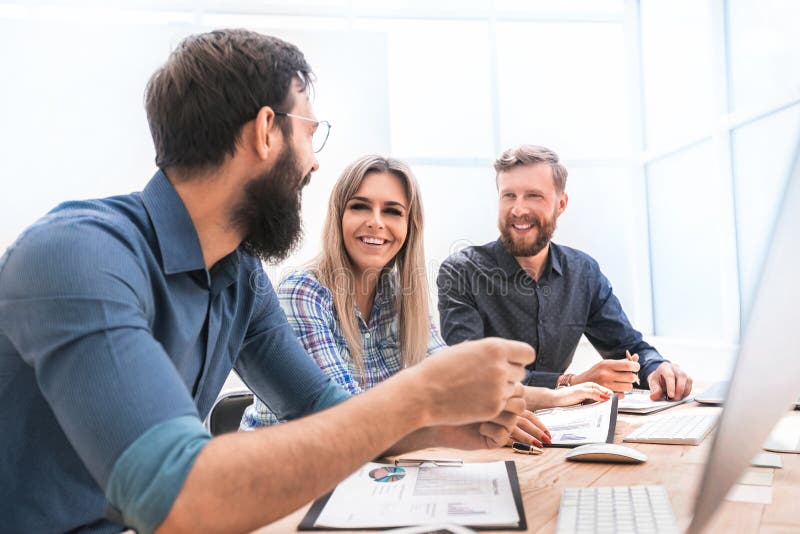 Experts Discussing Financial Documents at the Meeting Stock Photo ...